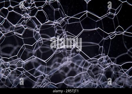 A grayscale of soap bubbles isolated on dark background Stock Photo - Alamy