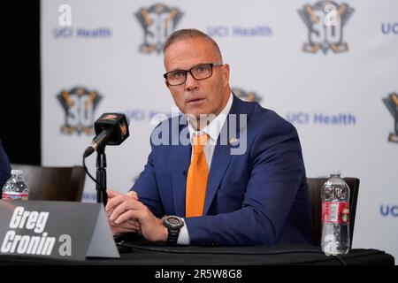 Greg Cronin speaks to reporters during a press conference announcing ...
