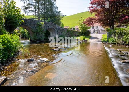 The Badgworthy water river flowing under Malmsmead bridge in Exmoor ...