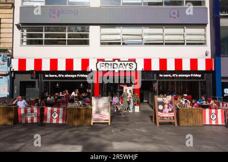 People eating at TGI Fridays restaurant, the O2 arena, Greenwich London ...
