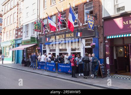 Tricolours and Union Jacks flying outside the French House pub on Dean ...