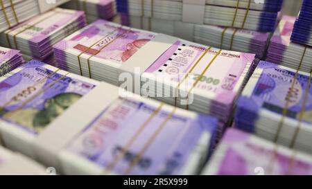 many stacks of Indian rupee notes. A lot of money isolated on green ...