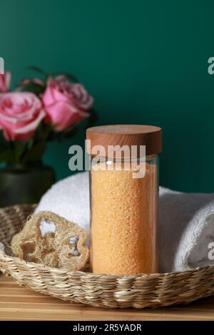 Composition with cosmetic products and beautiful roses on color ...