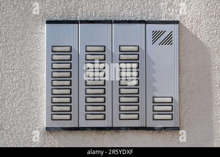 Intercom station on wall outdoors, space for text. Security system ...