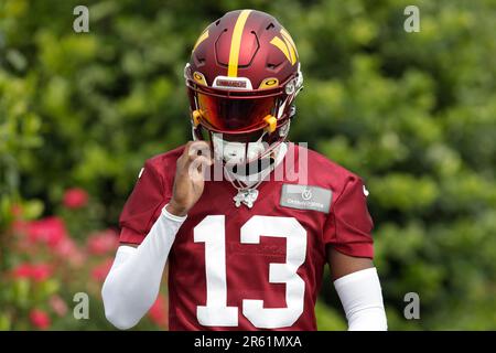 Washington Commanders cornerback Emmanuel Forbes Jr. holds the ball ...