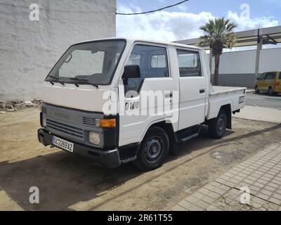 A view of an old white Toyota Hiace van parked outdoors Stock Photo - Alamy