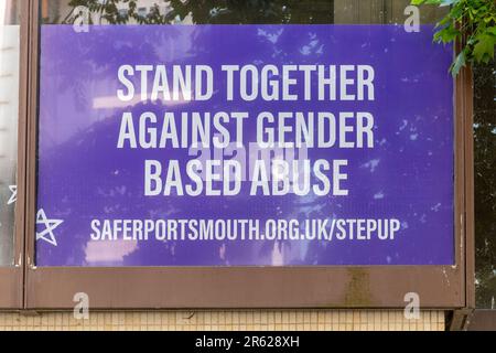 Notice with message; Stand together against gender-based abuse, slogan ...