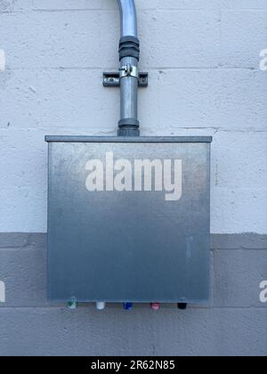 Close up of the outlet valve on an industrial IBC container used for ...