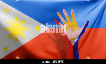 A human hand with a Philippine flag color. Philippines Independence Day ...