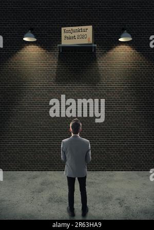 A cardboard box with the inscription economic stimulus package 2020 on ...