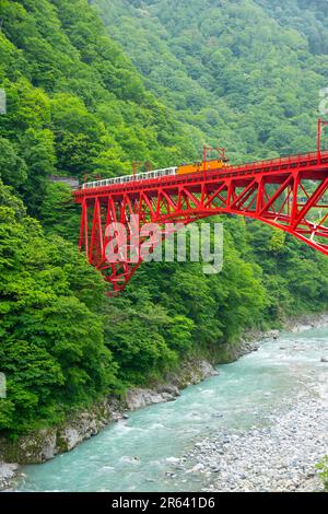 Kurobe Valley trolley car crossing the Shin Yamahiko Bridge Stock Photo ...
