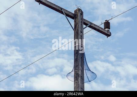 Nylon mesh prevent snake to climb on electric pole, and blue sky ...