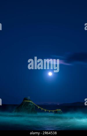 Husband and Wife Rocks and full moon Stock Photo - Alamy