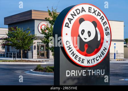 The exterior sign and logo of Panda Express, a chain Chinese restaurant ...