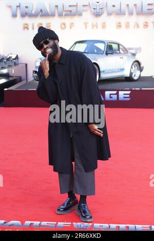 TRANSFORMERS: RISE OF THE BEASTS, Tobe Nwigwe (seated, left), Anthony ...