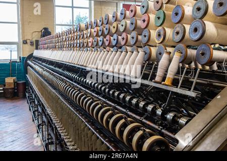 This image depicts a modern industrial machine used to create cone ...