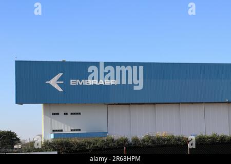 Embraer factory view against blue sky Stock Photo - Alamy