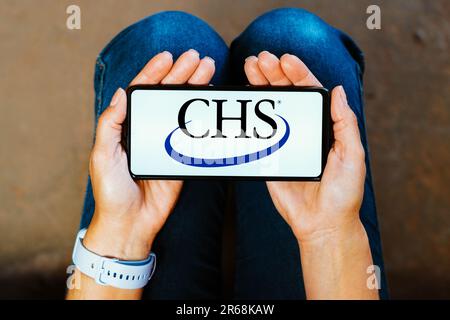 In this photo illustration, the CHS Inc. logo seen displayed on a ...