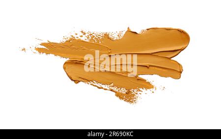 Light brown oil paint strokes on white background, top view Stock Photo ...