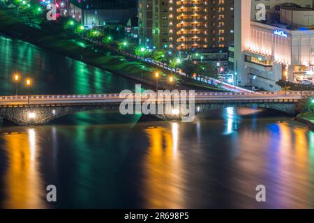 Historic Bandai Bridge and the beautiful night view along the Niigata ...