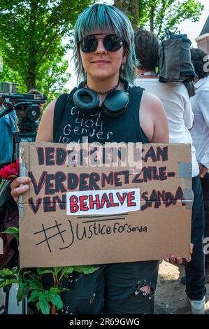 The Hague, 07/06/2023, A protester holds a placard during the Sanda Dia ...