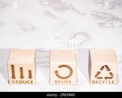Reduce, Reuse, and Recycle symbols as a resources conservation concept Stock Photo - Alamy