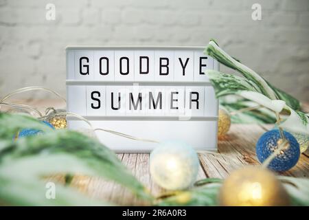 Welcome September text message with LED cotton balls decorate on wooden ...