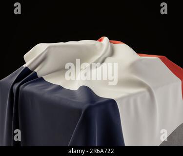 A france flag draped over a stone plinth on an isolated dark studio ...