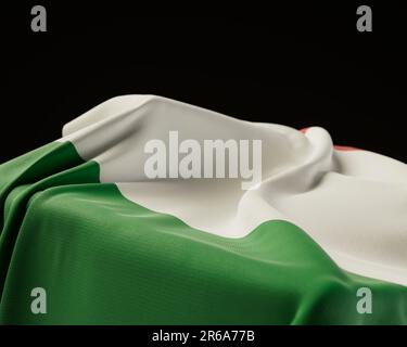 A italy flag draped over a stone plinth on an isolated dark studio ...