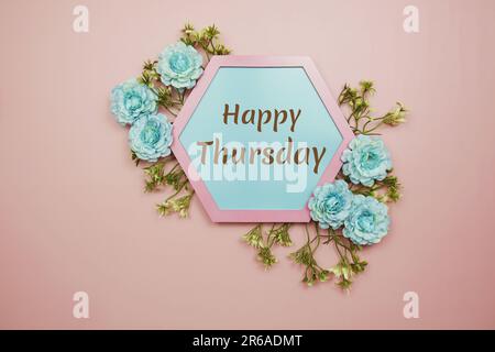 Hello Thursday text with Pink Flower frame on blue background Stock ...