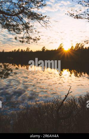 A mesmerizing scenery of a golden sunset over Trinidad and Tobago from ...