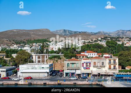 View of Chios town and port, as seen from aboard a vessel. A blue ...