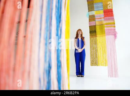 Laura Cross with her textile collection 'Woven Colour' at the National ...