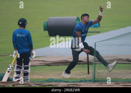 Uncapped fast bowler Mohammad Musfik Hasan (L) attends practice session ...