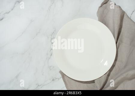 Empty white plate on gray background. Soup dish. Modern kitchen. Single ...