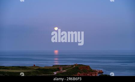 MOON RISE OVER DEVON CLIFFS Stock Photo - Alamy