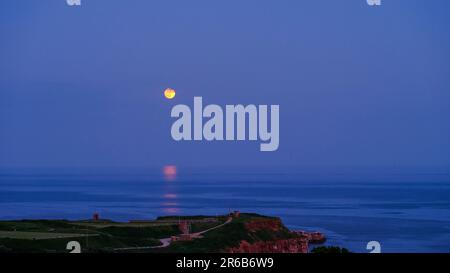 MOON RISE OVER DEVON CLIFFS Stock Photo - Alamy