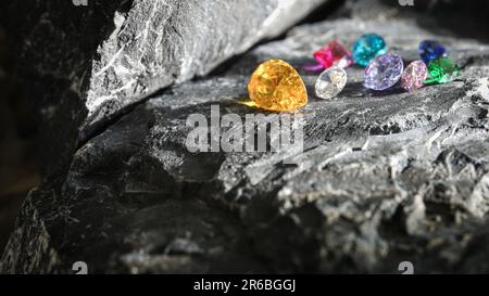 The glimmering natural colorful sapphire gemstones on a rugged rock ...