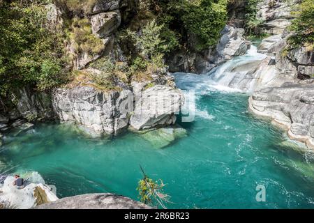 The Potholes of the Giants in the Toce River with green water and ...