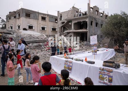 Residents view mortars and fragments of exploded Israeli missiles on ...