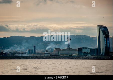 Cruise ships smokestacks give off smoke in the port of Barcelona ...