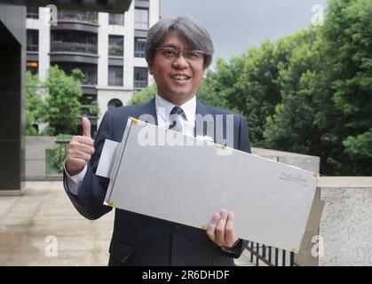 Founder and CEO of Prologium Vincent Yang delivers a speech during a ...