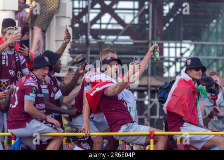 Players at West Ham Utd football team's open top bus victory parade to ...