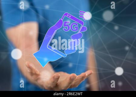 5g concept above the hand of a man in background Stock Photo - Alamy