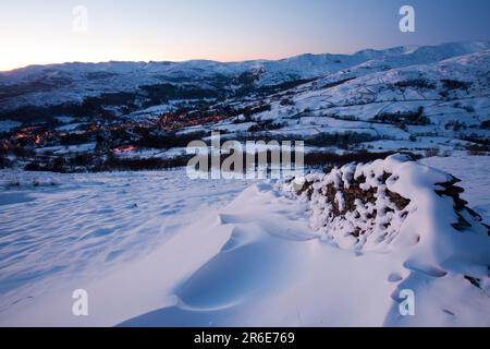 Ambleside in winters snow at dusk from Todd crag, Lake District, UK ...