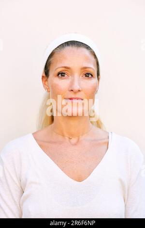 Close up photo of pretty teacher touching her specs wearing maroon ...