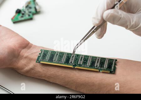 The man shows his hand with a chip implanted. The concept of chipping ...