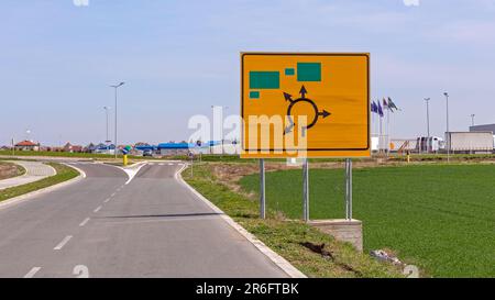 Empty Roundabout Intersection Yellow Traffic Direction Sign Copy Space ...