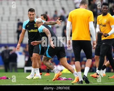 Inter Milan's Lautaro Martinez, left, celebrates with Inter Milan's ...