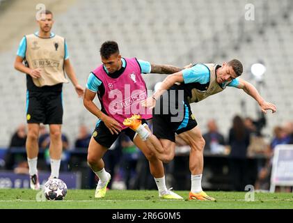 Inter Milan's Lautaro Martinez, centre, scores his side's opening goal ...